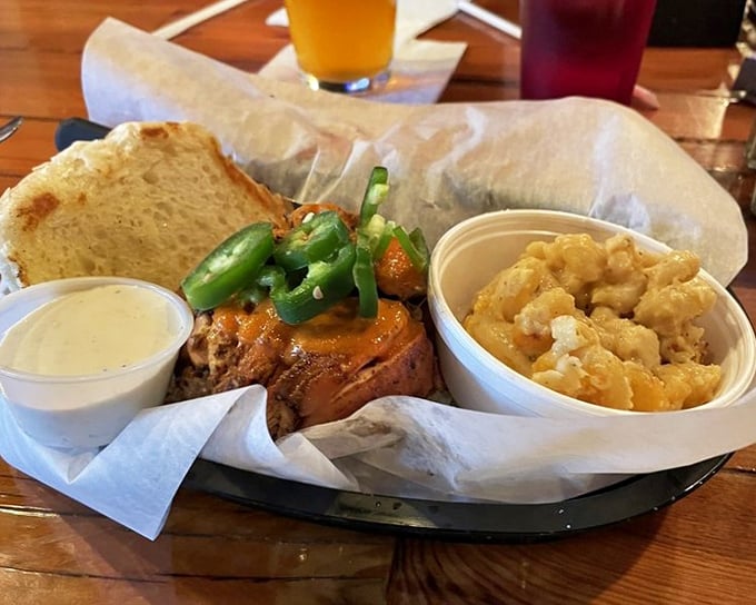 A sandwich that's basically wearing a "Most Likely to Make You Moan Out Loud" sash. Those jalapeños on top aren't garnish—they're exclamation points.
