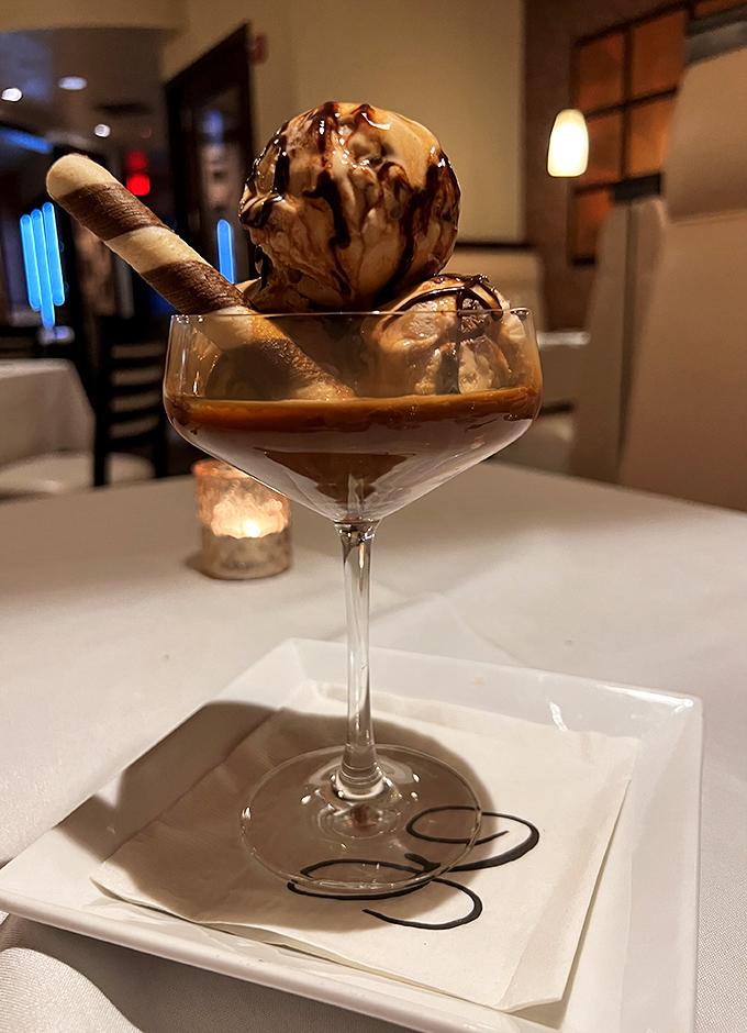 Not just dessert, but the grand finale—ice cream and chocolate sauce with a cookie garnish that makes you reconsider the concept of "too full."