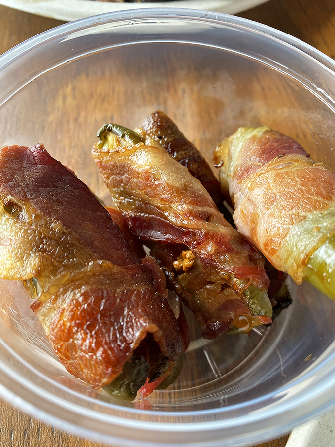 Jalapeño poppers wrapped in bacon—because sometimes vegetables need to be improved upon with more meat. Genius in its simplicity.