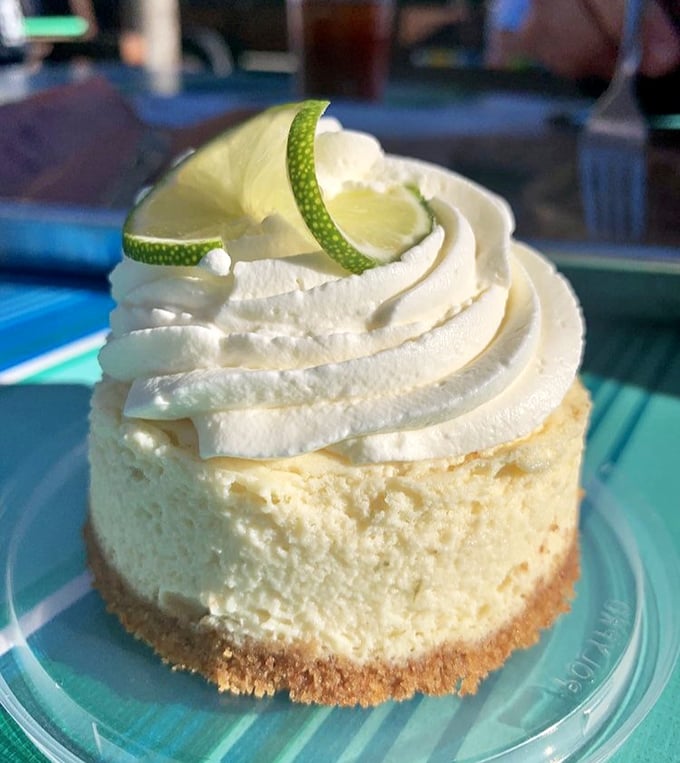 Key lime cheesecake topped with a cloud of whipped cream – because after a meat marathon, you deserve a victory lap.