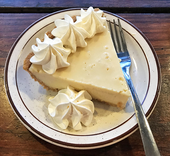 Key lime pie that strikes the perfect balance between tart and sweet – topped with clouds of whipped cream that melt into citrus heaven.