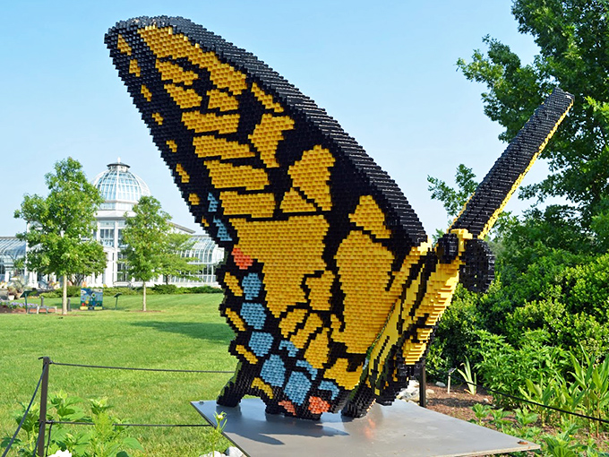 This isn't your childhood LEGO creation—a stunning butterfly sculpture takes flight, proving gardens can surprise you at every turn.