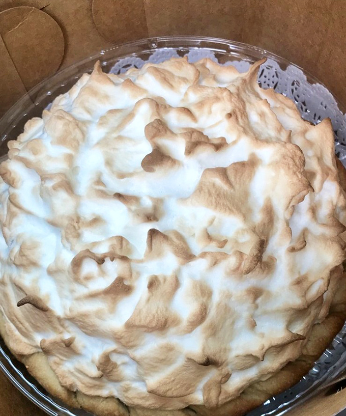 Lemon meringue pie with peaks so perfect they could make the Alps jealous—a sweet-tart symphony under a cloud of toasted bliss.
