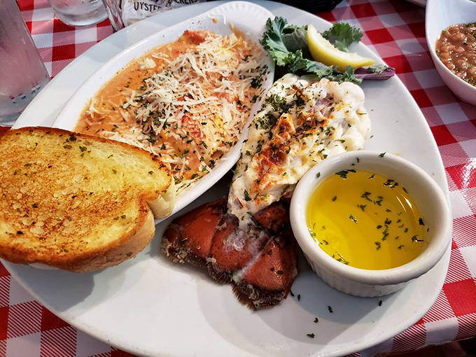 This lobster tail and ravioli plate isn't just dinner—it's edible evidence that sometimes you really can have it all.
