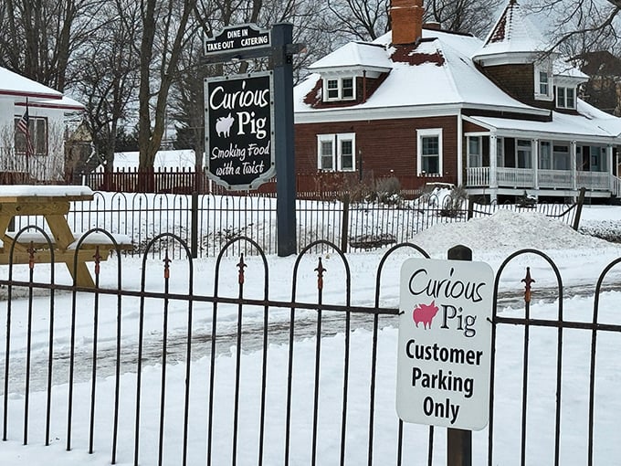 The Curious Pig isn't just surviving winter—it's thriving, proving that comfort food tastes even better when there's snow up to your knees outside.