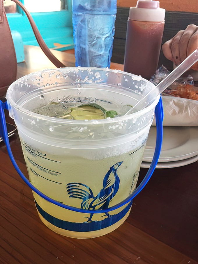 Nothing says "vacation mode activated" quite like a bucket of margaritas with the Gulf of Mexico as your backdrop.