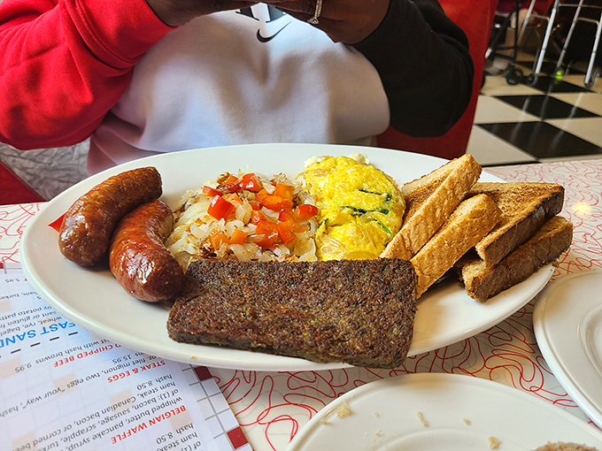 The breakfast of champions isn't cereal—it's this plate of meatloaf, sausage, and a fluffy omelet that fuels Delaware's finest.
