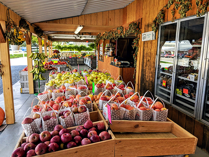Miller's Farm Market displays nature's candy in wooden baskets. Those apples didn't travel from New Zealand—they probably grew within eyesight of where you're standing. 