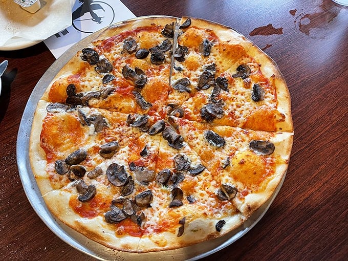 Pizza perfection with mushrooms and pepperoni – that crispy-yet-chewy crust and bubbling cheese remind us why some classics never need reinvention.