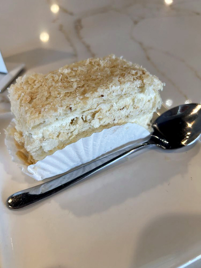 This Napoleon pastry isn't just dessert—it's architecture. Delicate layers stacked with precision that would make any French pastry chef give a respectful nod.