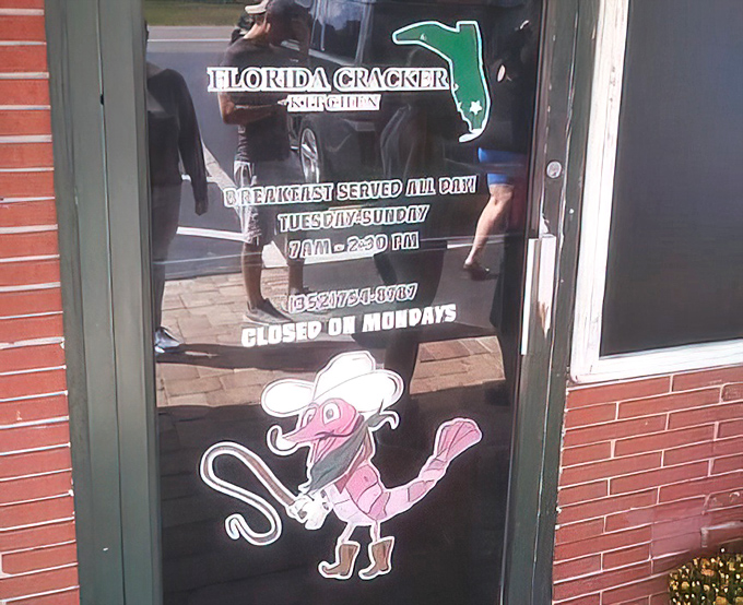 The pink shrimp mascot on the door says everything you need to know: this place doesn't take itself too seriously—just its food.