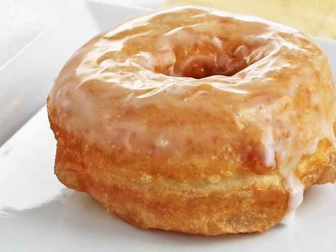 The Audrey Hepburn of donuts—timeless, elegant, and universally adored. This classic glazed demonstrates why sometimes the simplest pleasure is the most satisfying.