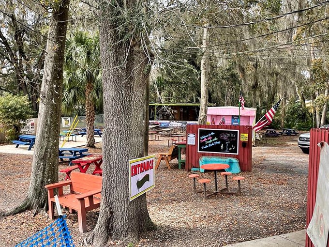 Outdoor seating under Spanish moss-draped oaks offers the perfect Florida dining experience – casual, breezy, and absolutely unforgettable.