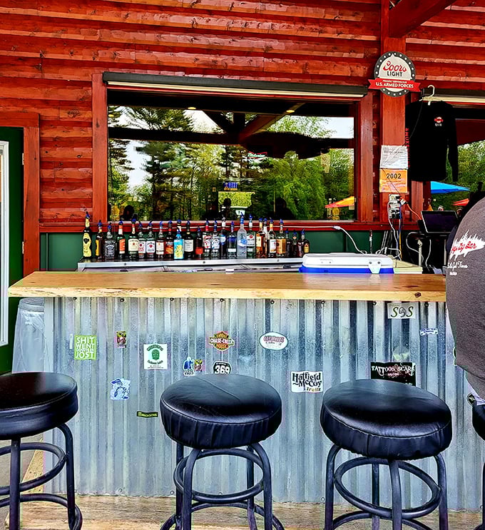 The outdoor bar combines corrugated metal, wood, and enough spirits to make you forget you're in the middle of nowhere—in the best possible way.