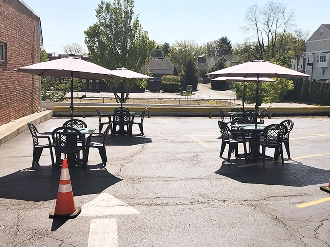 The outdoor seating area offers fresh air dining options where your breakfast comes with a side of sunshine and people-watching.