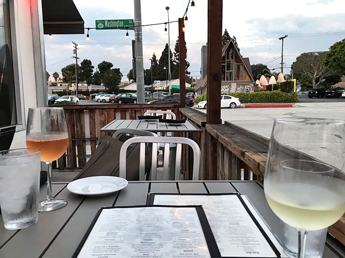 The outdoor patio – where rosé meets sunset views and you contemplate ordering everything on the menu. Again.