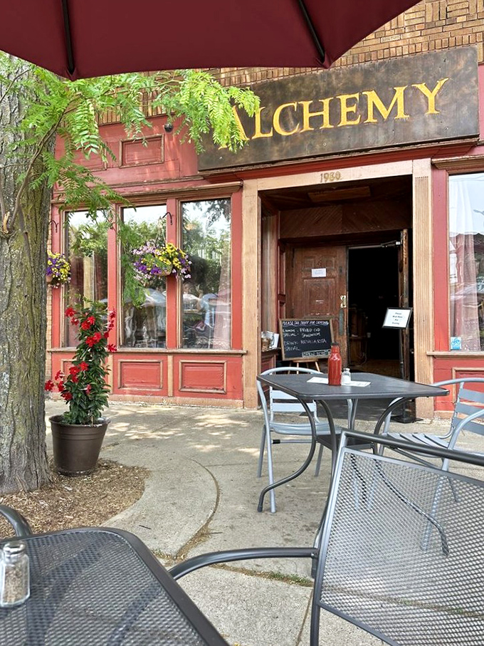 The sidewalk seating where summer afternoons stretch into evening. Red brick and blooming flowers frame Madison's favorite neighborhood gathering spot.