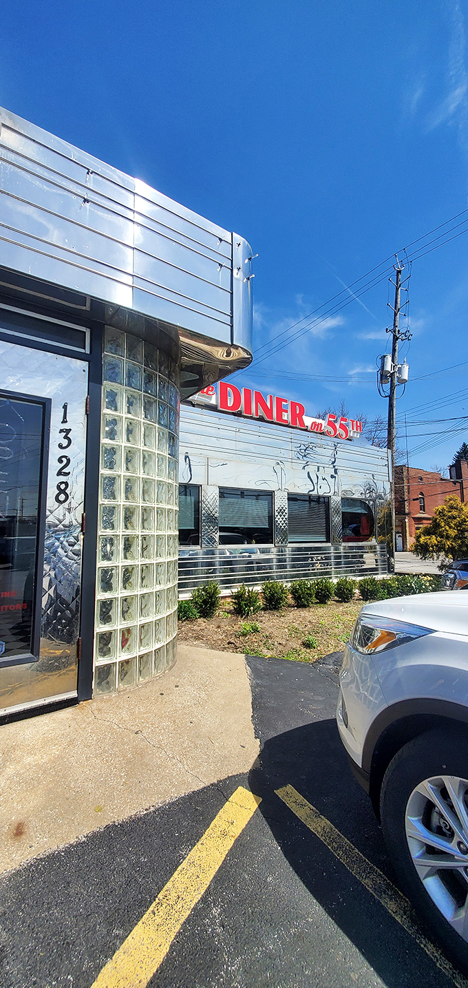 The address proudly displayed – 1328 East 55th Street – where chrome meets sky in a temple dedicated to the art of diner food.