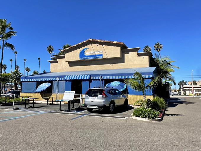 Palm trees stand sentinel outside this unassuming breakfast temple, where California sunshine and coffee cake create perfect morning memories.