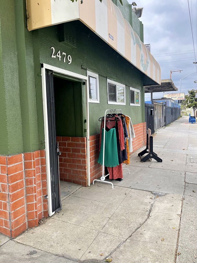 Address 2479: where sidewalk racks offer a preview of the style revolution happening inside. Fashion's most inviting doorway.