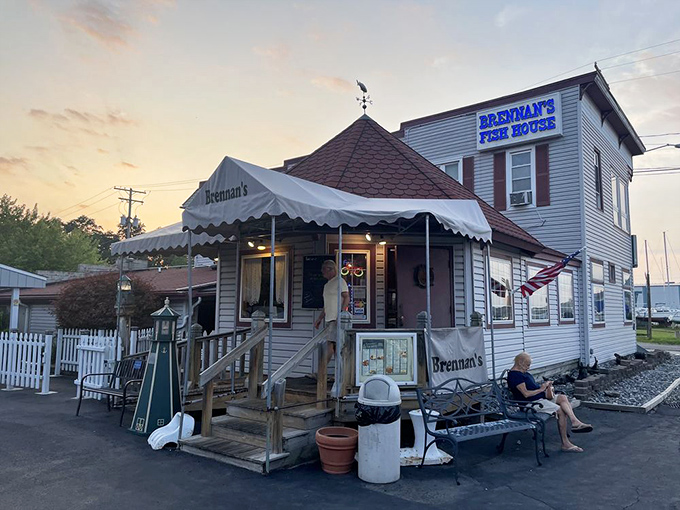 As dusk settles over Brennan's, the glowing windows promise seafood treasures inside that rival any sunset view.