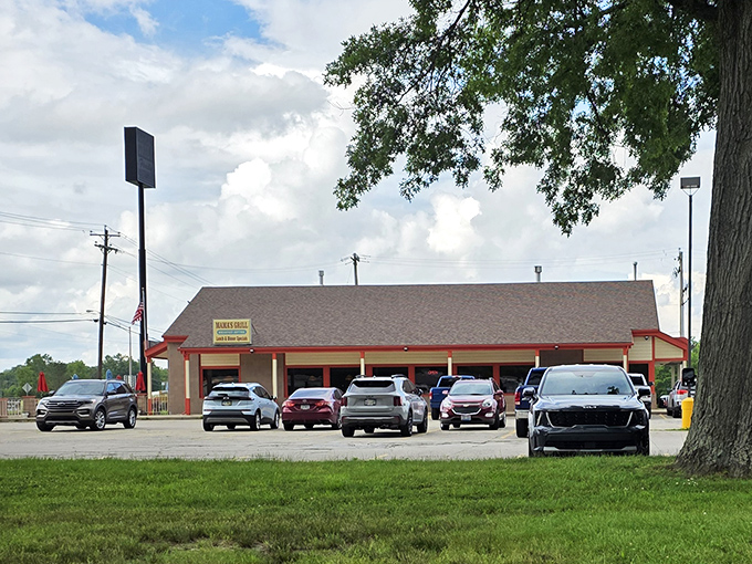 From this angle, Mama's looks like what it is—a humble building housing extraordinary food. Those full parking spaces tell the real story.