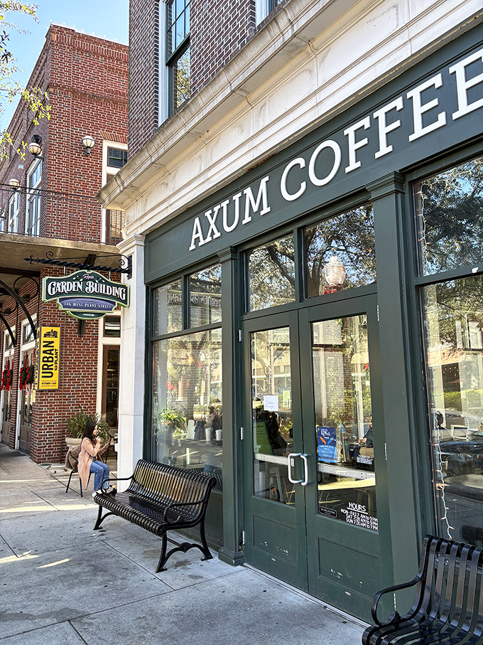 Those green doors might as well have a sign saying "Happiness Inside" – Winter Garden's favorite coffee spot beckons.