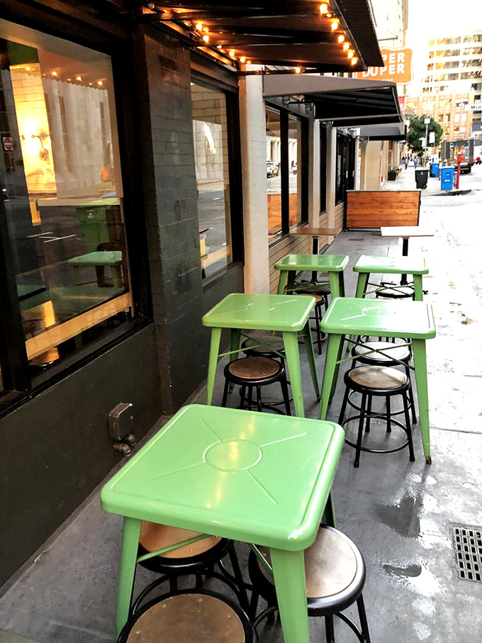 Those cheerful green outdoor tables say, "San Francisco weather be damned, we're optimists who believe in al fresco dining"—and sometimes, the fog actually cooperates.