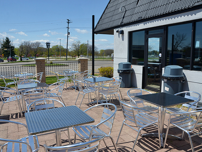 When Wisconsin weather cooperates, this patio becomes prime real estate for enjoying smoky treasures under blue skies – just bring your appetite and leave your pretensions at home.