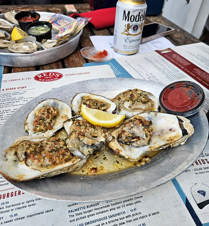 Baked oysters on the half shell—each one a little ocean jewel box containing treasures of garlic, butter, and coastal perfection.