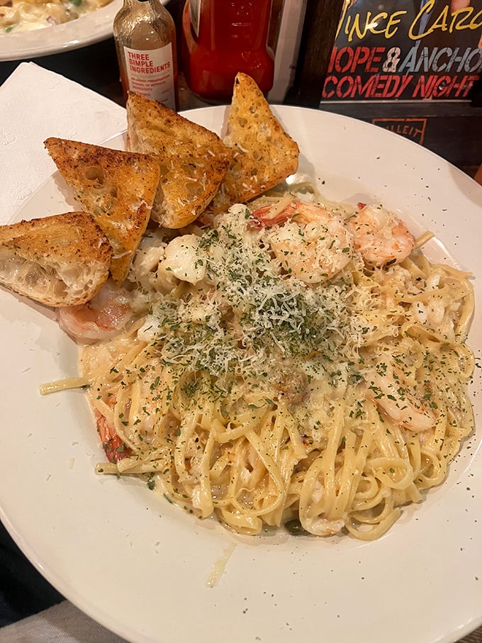 Pasta that proves the English pub has evolved beyond meat pies. Those garlic bread triangles are the perfect tools for sopping up every last drop.