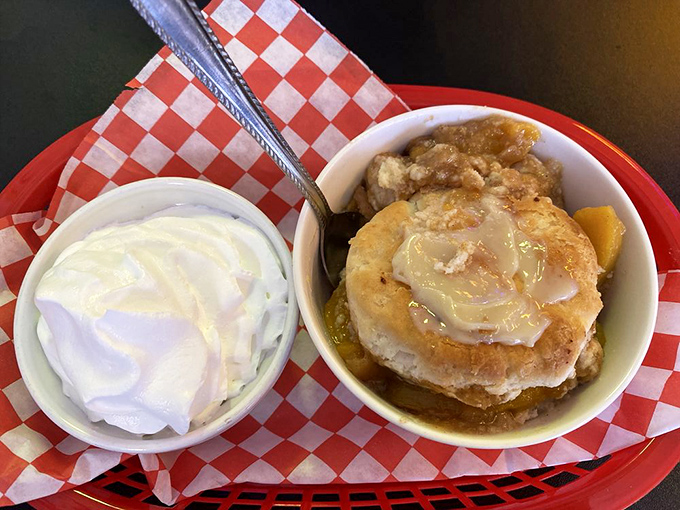 Peach cobbler with a scoop of vanilla. Because after a BBQ feast, you deserve a proper Southern ending.