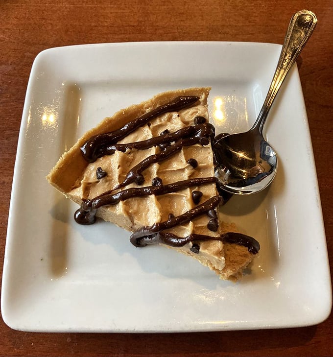The peanut butter pie might cause inappropriate noises of delight—a silky, chocolate-drizzled slice of heaven that deserves its own thank-you note.