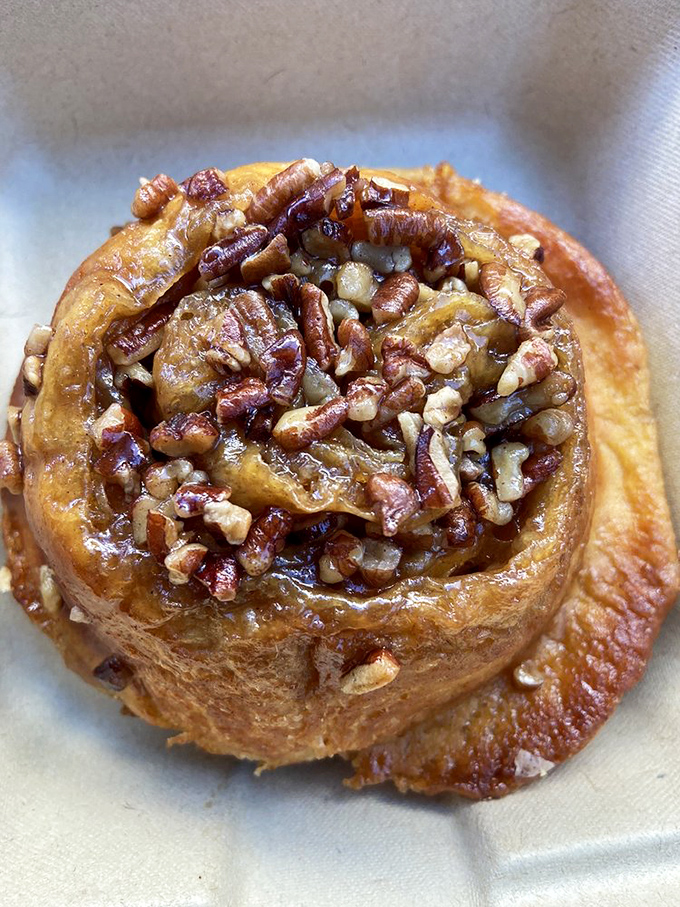 This cinnamon roll with pecans isn't just breakfast—it's dessert with a morning permission slip. The kind of spiral that leads only to happiness.