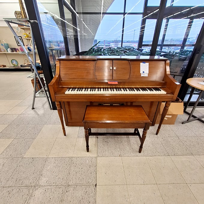 A piano waits silently for new fingers to bring it back to life—proof that at CommunityAid, even music gets a meaningful second act.