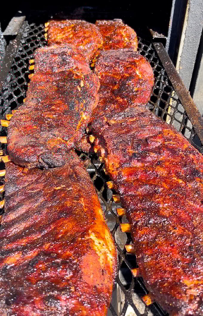 Ribs in their natural habitat – on the smoker, bathed in heat and smoke, transforming into the stuff of Detroit BBQ legend.