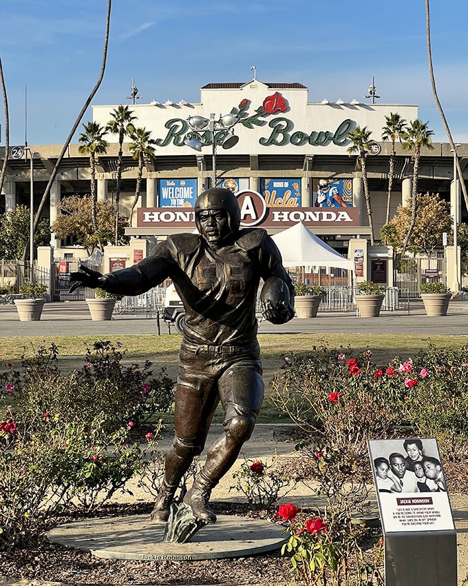 Even football legends stand guard outside this treasure trove, silently judging those who leave without making at least one impulse purchase.