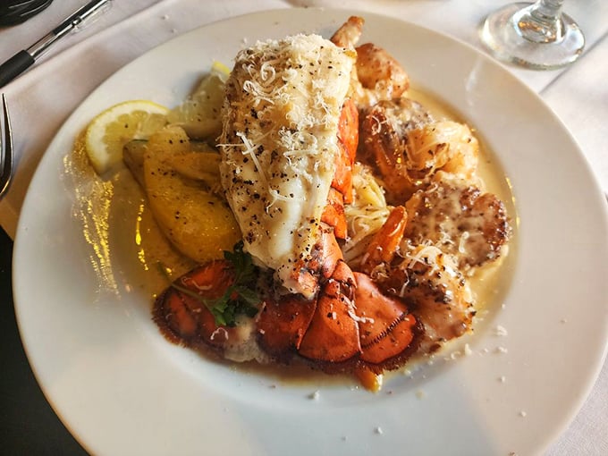 This isn't just seafood—it's an ocean romance where lobster and shrimp have found their soulmate in a buttery, garlicky sauce.