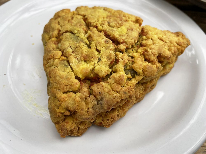 This rustic scone isn't just baked—it's crafted with the kind of care that makes you want to hug the baker and steal their recipe.