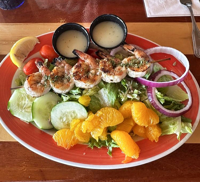 This isn't just a shrimp salad—it's a colorful celebration where grilled shrimp mingle with citrus segments like they're at the world's healthiest party.