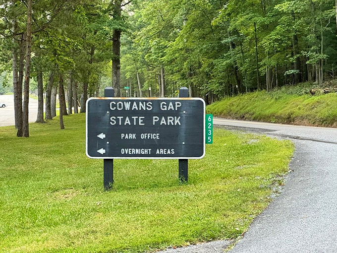 The entrance sign—your official invitation to leave stress behind. Consider this your permission slip for a day of outdoor therapy.