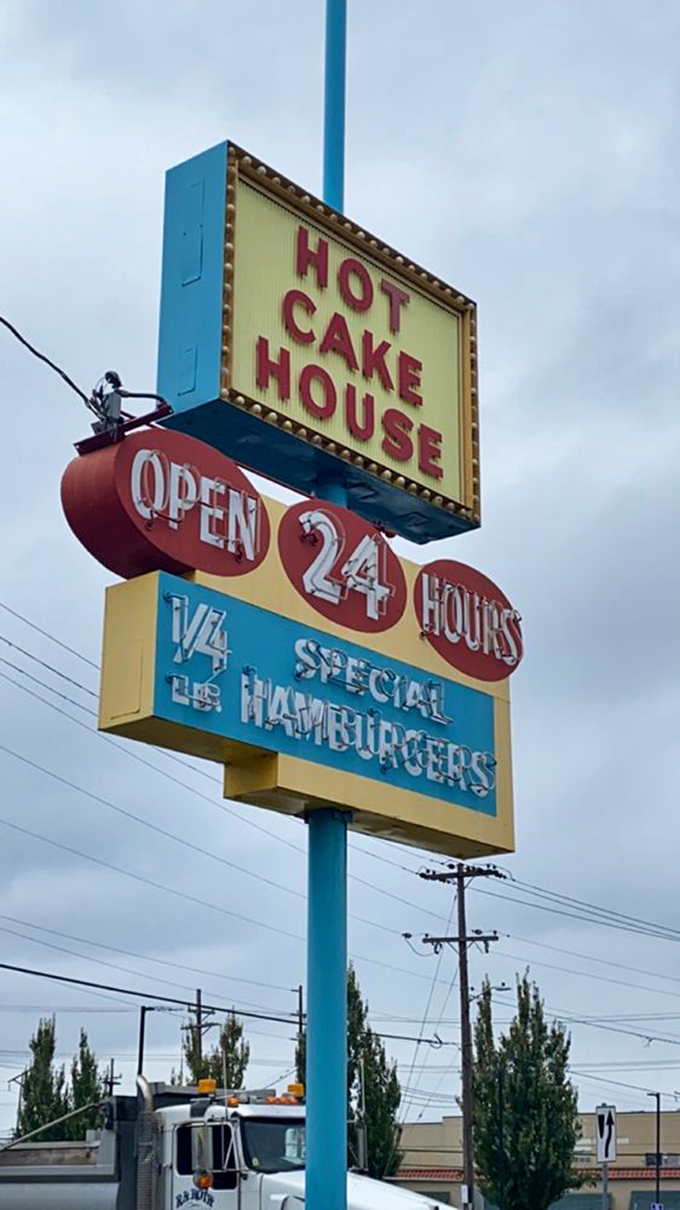 The sign says it all – this is where hotcake dreams come true, one stack at a time.