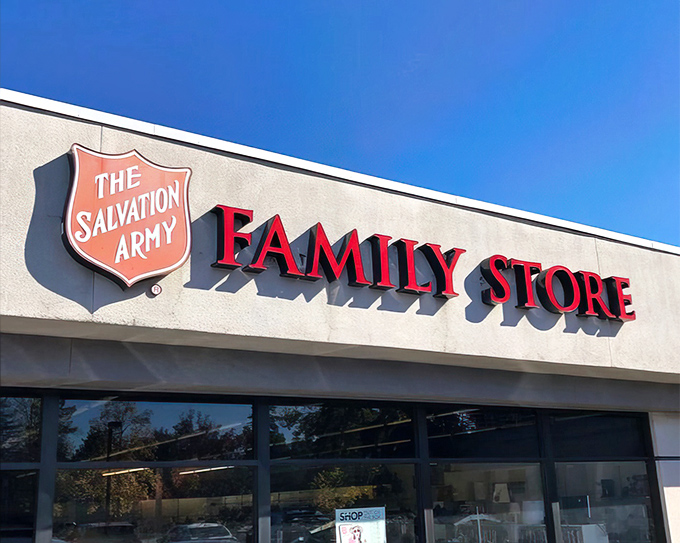 That bold red shield against clear California sky isn't just signage—it's a beacon for bargain hunters and community supporters alike.