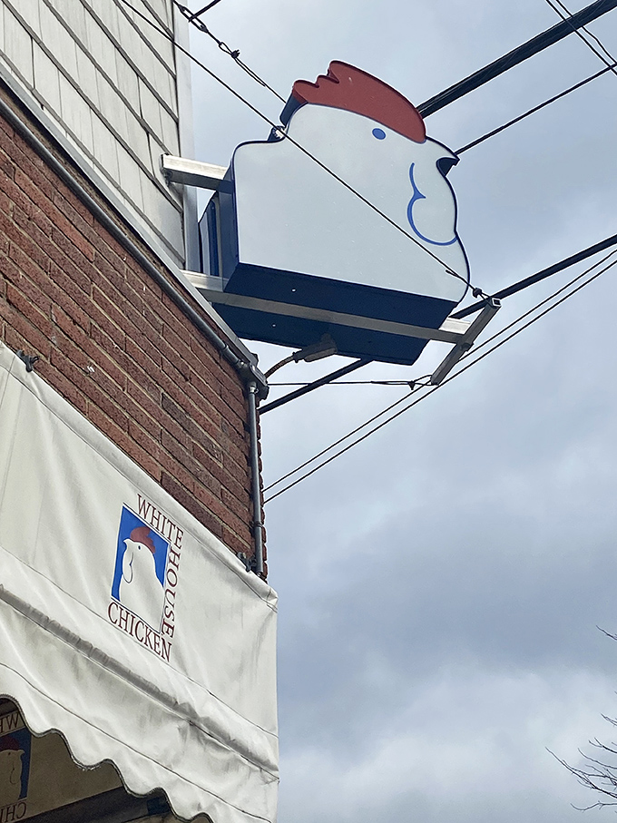 That iconic chicken sign has guided hungry pilgrims for generations. Like a poultry lighthouse beckoning travelers toward crispy, golden shores.
