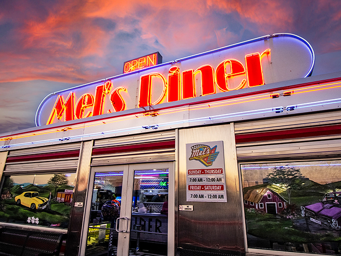 When that neon sign glows against a Tennessee sunset, it's not just advertising breakfast – it's broadcasting pure Americana on a frequency only hungry hearts can hear.