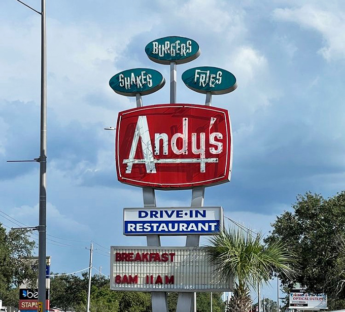 That sign isn't just advertising—it's a landmark. Locals give directions based on its location: "Two lights past Andy's, then hang a right."