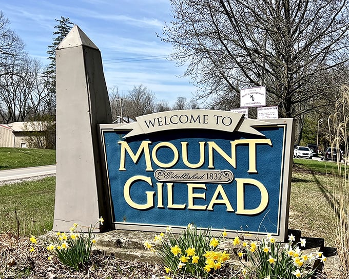 Spring daffodils frame Mt. Gilead's welcome sign – nature's way of adding a cheerful yellow exclamation point to your arrival.