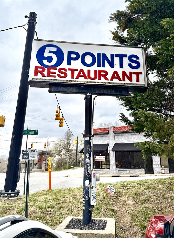 A sign that says "good food here" without actually having to say it. Positioned at the crossroads, just like the restaurant's place in the community.