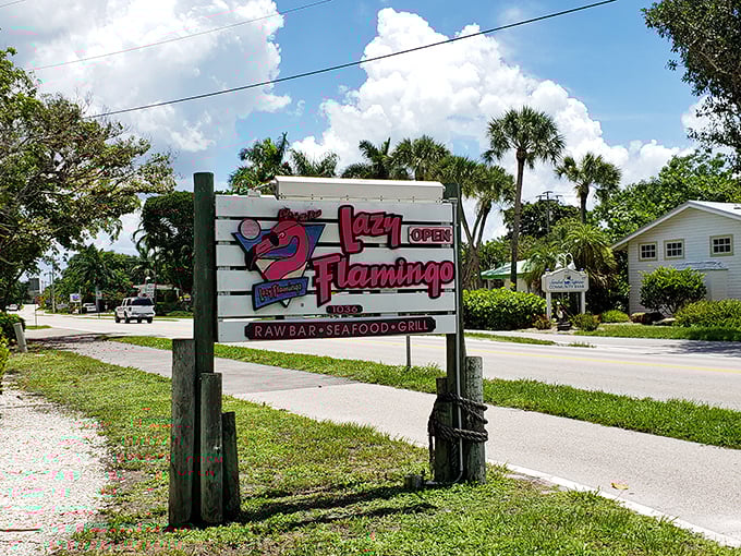 Your beacon to brilliant bites! This roadside sign is the culinary lighthouse guiding hungry travelers to seafood salvation.