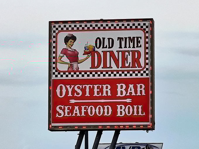 The roadside sign proudly announces the diner's seafood credentials—because nothing says "Florida diner" quite like adding an oyster bar to your 1960s time capsule.